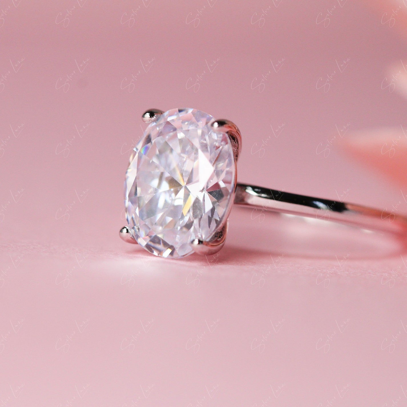 Oval cubic zirconia engagement ring in sterling silver – The Silver Luna