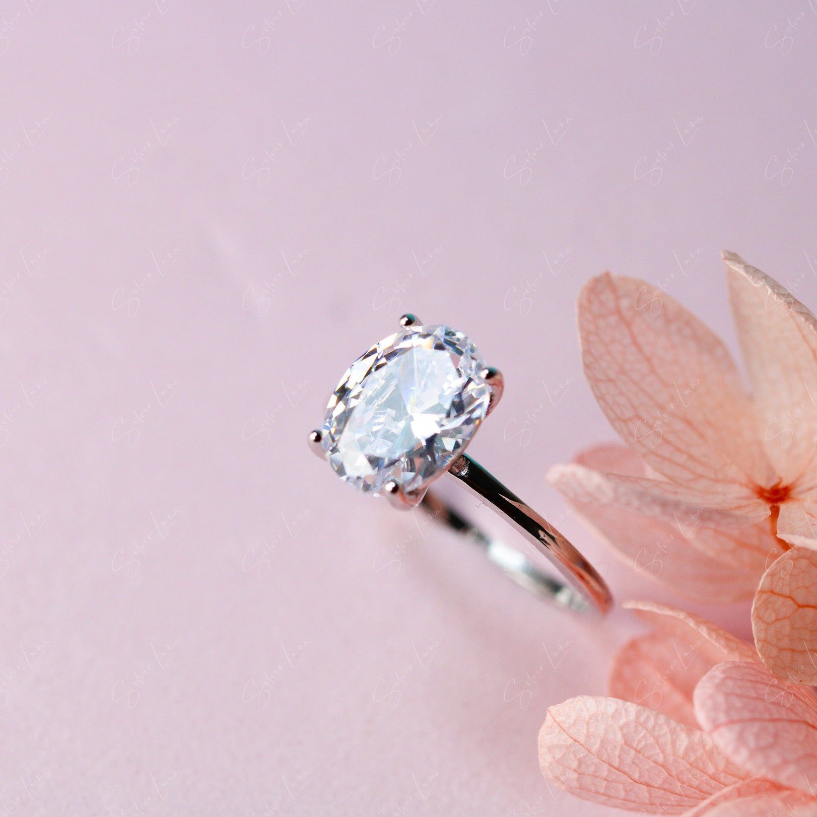 Oval cubic zirconia engagement ring in sterling silver – The Silver Luna